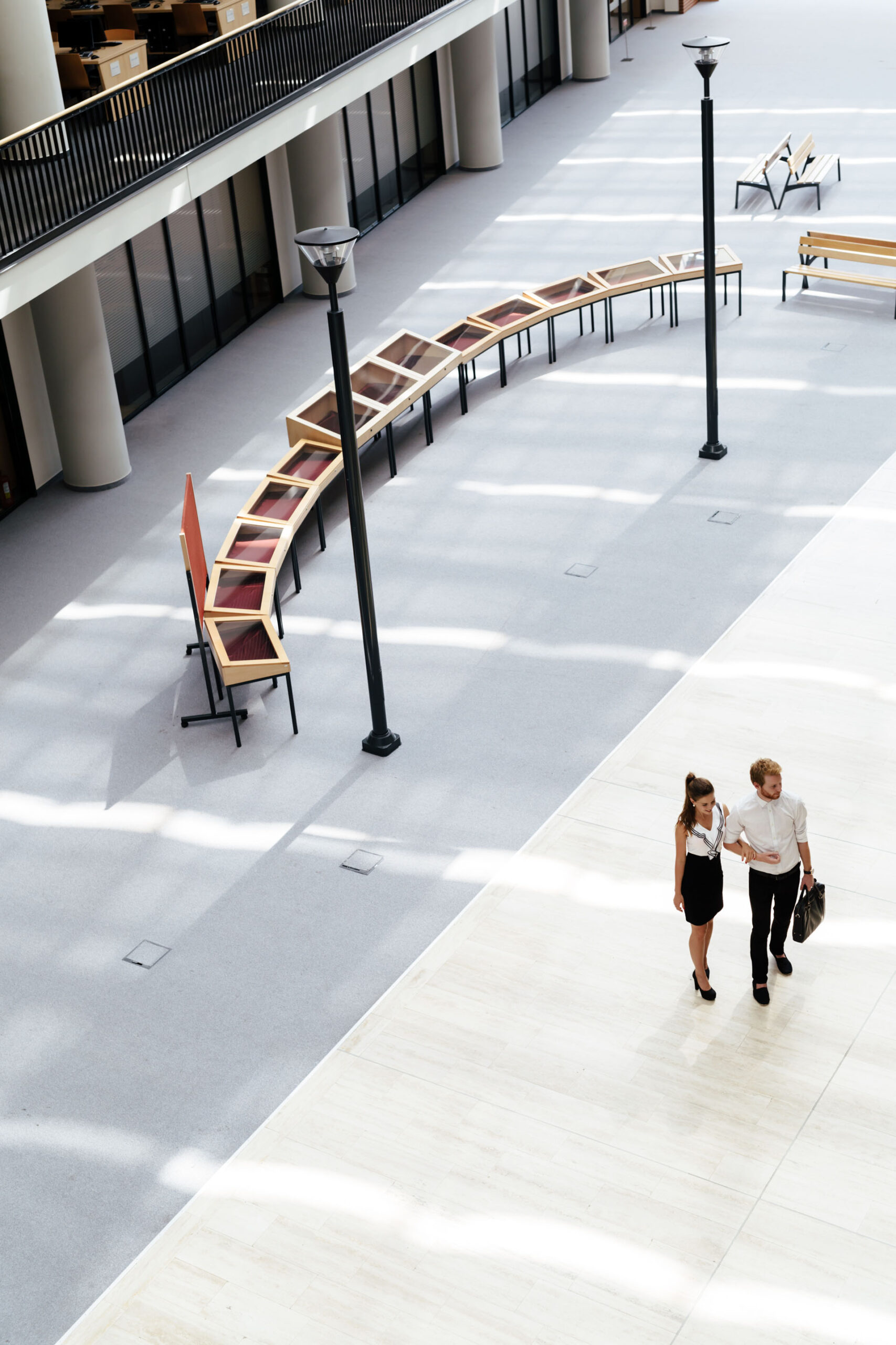 Business Couple Walking Together – EGSL